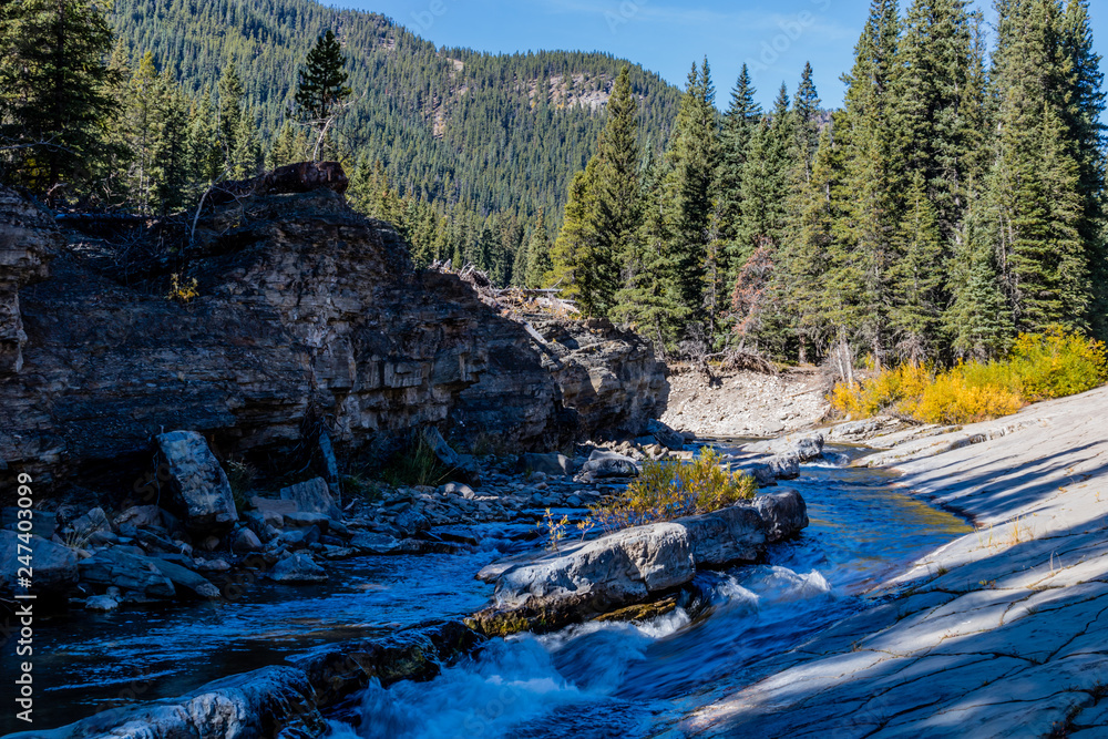The Livingston River flows over the chutes that make up the falls ...