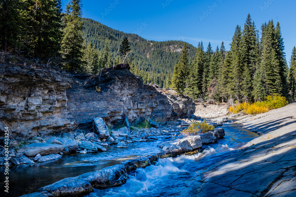 The Livingston River flows over the chutes that make up the falls ...