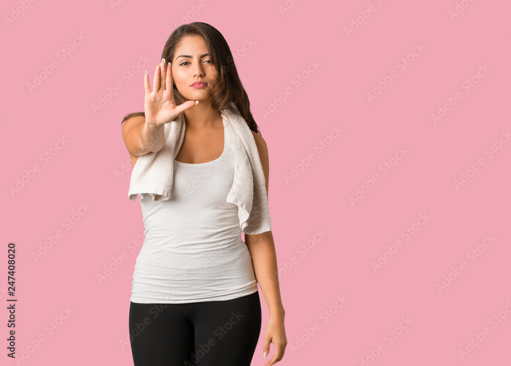 Full body young fitness curvy woman putting hand in front Stock Photo ...