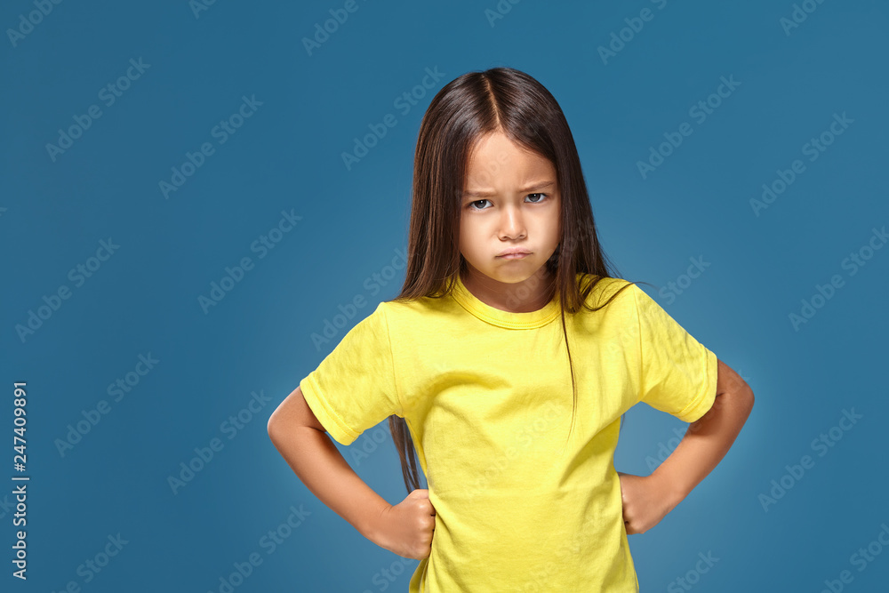 Angry little kid showing frustration and disagreement Stock Photo ...