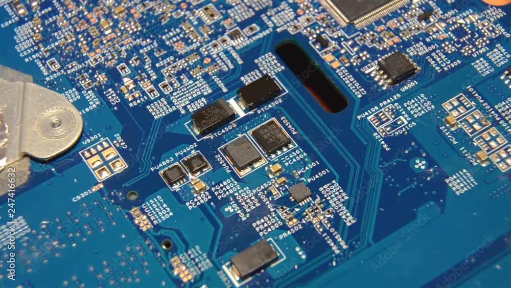 chip soldering. chip soldering. replacement of a faulty chip. Male hand ...