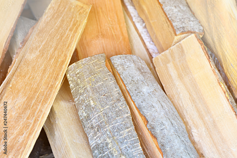 Neatly stacked firewood from Alder wood on full frame background Stock ...
