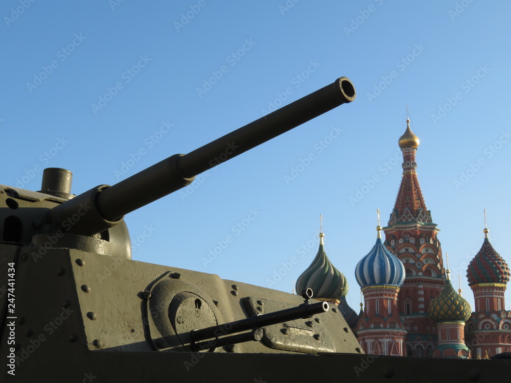 Russian army, tank gun against the St. Basil's Cathedral on Red square ...
