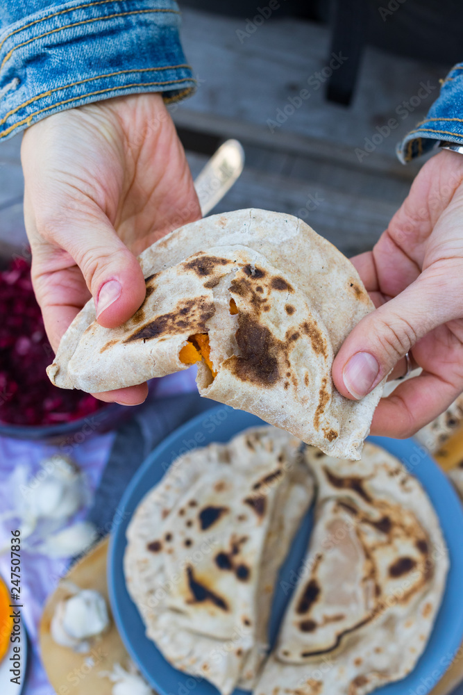 Hot chapati naan bread stuffed with sweet pumpkin. Indian traditional ...