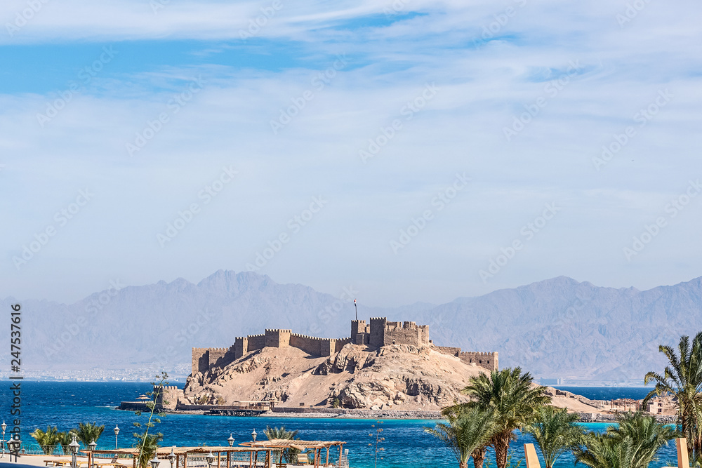 Ancient military fort Salah El Din Citadel on a small island on the ...