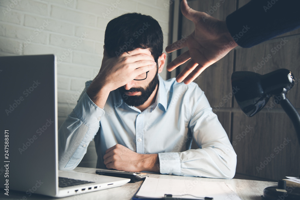 angry boss with sad man on office desk Stock Photo | Adobe Stock