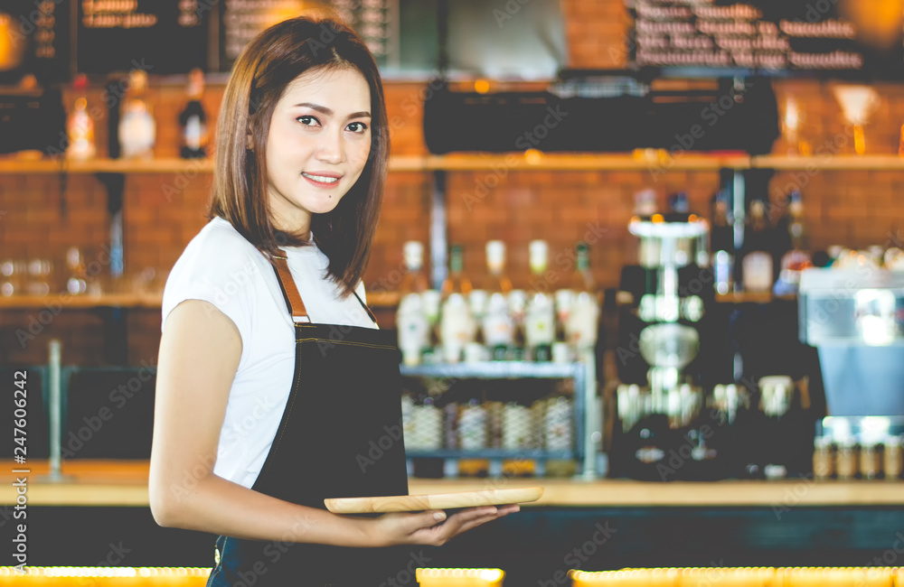 Part-time employee or café shop owner Asian women at the vintage-style ...