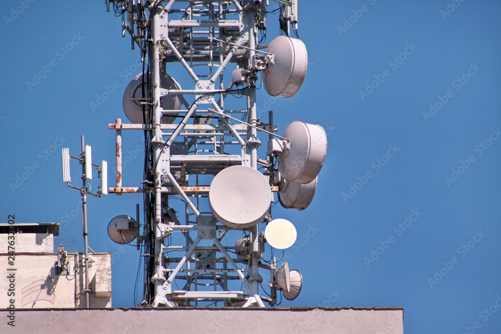 Telecommunication base stations network repeaters on the roof of ...