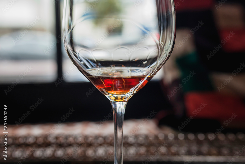 trails from aged sherry in a glass Stock Photo | Adobe Stock