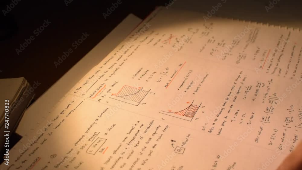 Video „Student hand studying and focusing hard equations and charts in ...