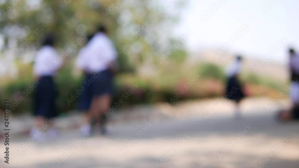 Blur background of high school students are playing traditional game in ...