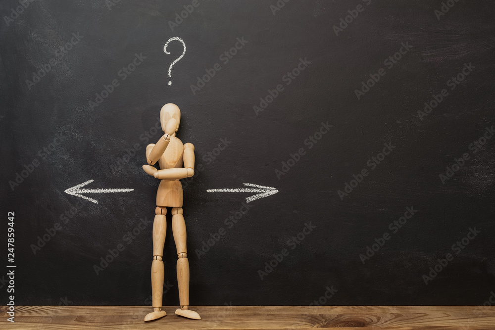 wooden man and question mark on chalkboard background Stock Photo ...