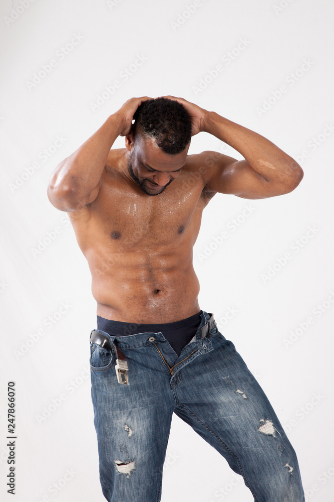 Handsome, shirtless black man looking down Stock Photo | Adobe Stock