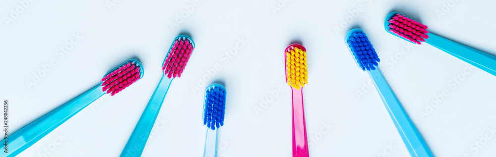 Composition frame of Colorful tooth brushes with bright color bristles ...
