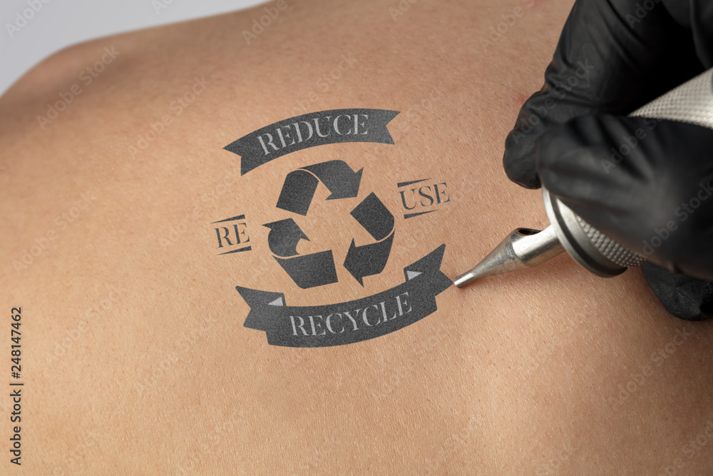 Hand tattooing recycle for a better environment concept on naked clear ...