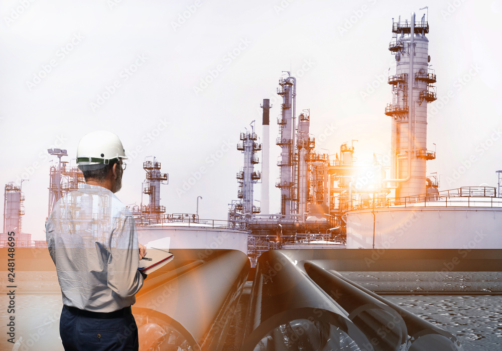 production engineer working on plant oil and chemical refinery Stock ...