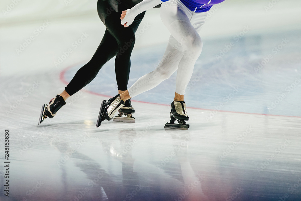 legs two athletes speed skaters running in speed skating Stock Photo ...