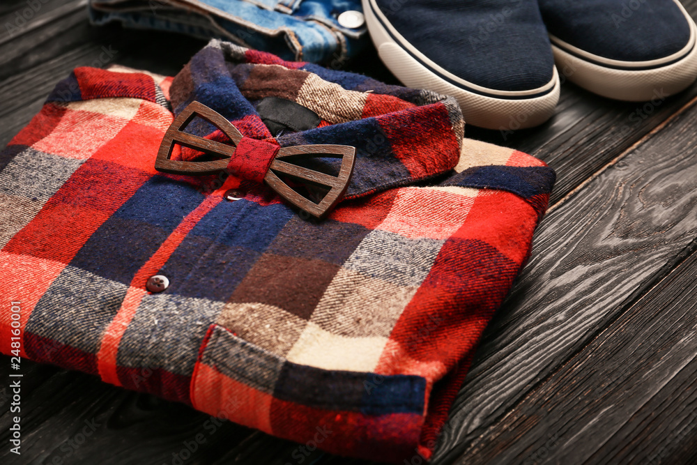 Male clothes on wooden background, closeup Stock Photo | Adobe Stock