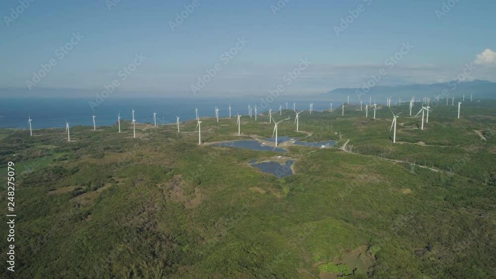 Aerial view of Windmills for electric power production on the seashore ...
