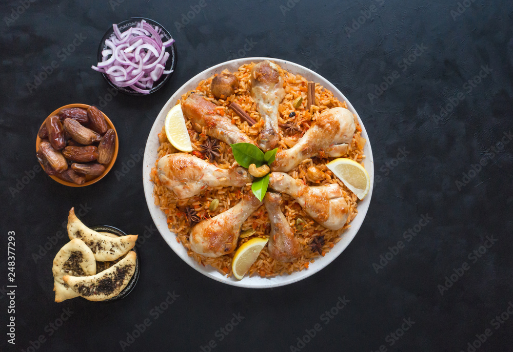 Chicken Mandi with dates. Arabic cuisine. Top view Stock Photo | Adobe ...