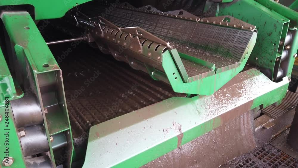 Shale shaker on an offshore oil rig separating the cutting from oil ...