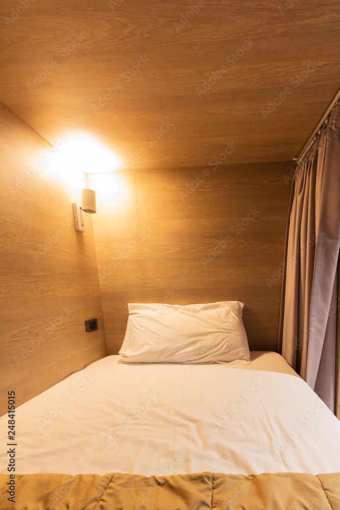 Interior view of capsule bedroom in hostel. Capsule bedroom, bed in box ...