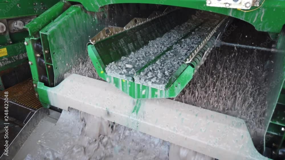 Shale shaker on an offshore oil rig separating the cutting from water ...