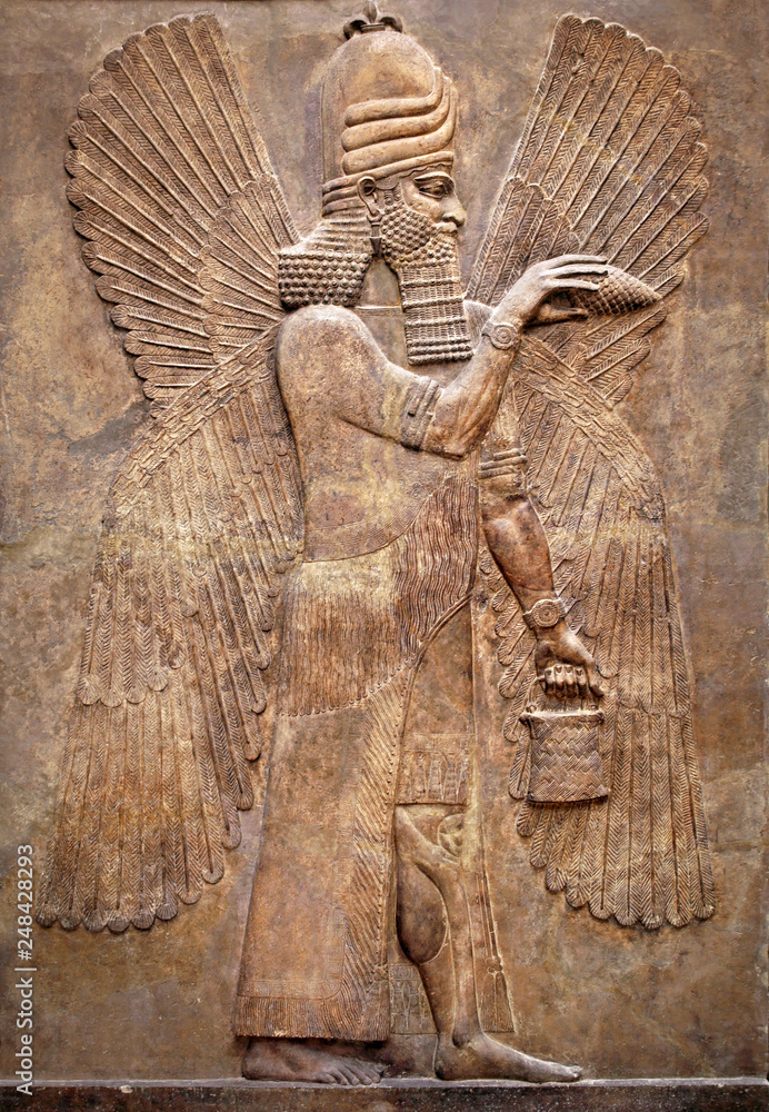 Assyrian wall relief of a winged genius 素材庫相片 | Adobe Stock