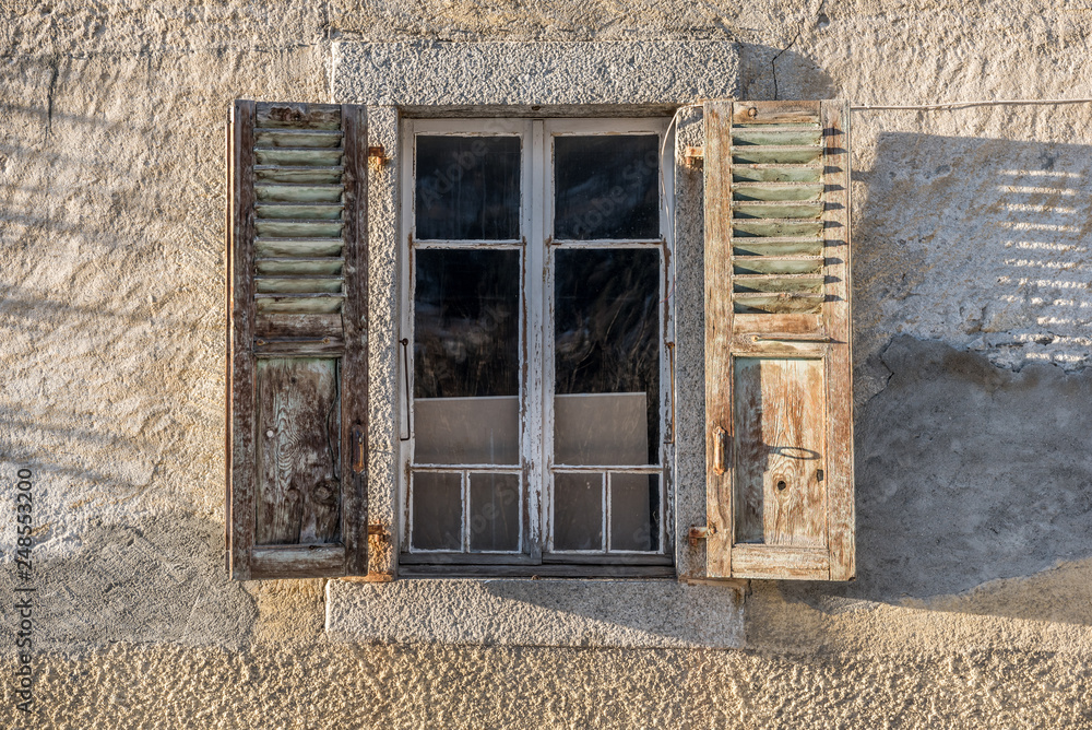 Poster Open dilapidated wood metal window shutters and white window ...
