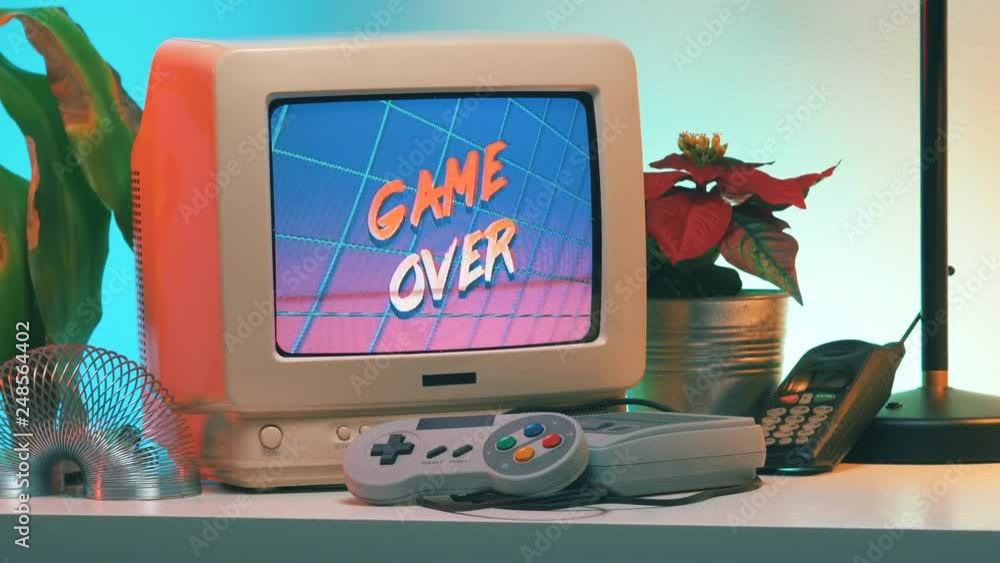 GAME OVER title on Old Computer - TV Screen while the camera is ...