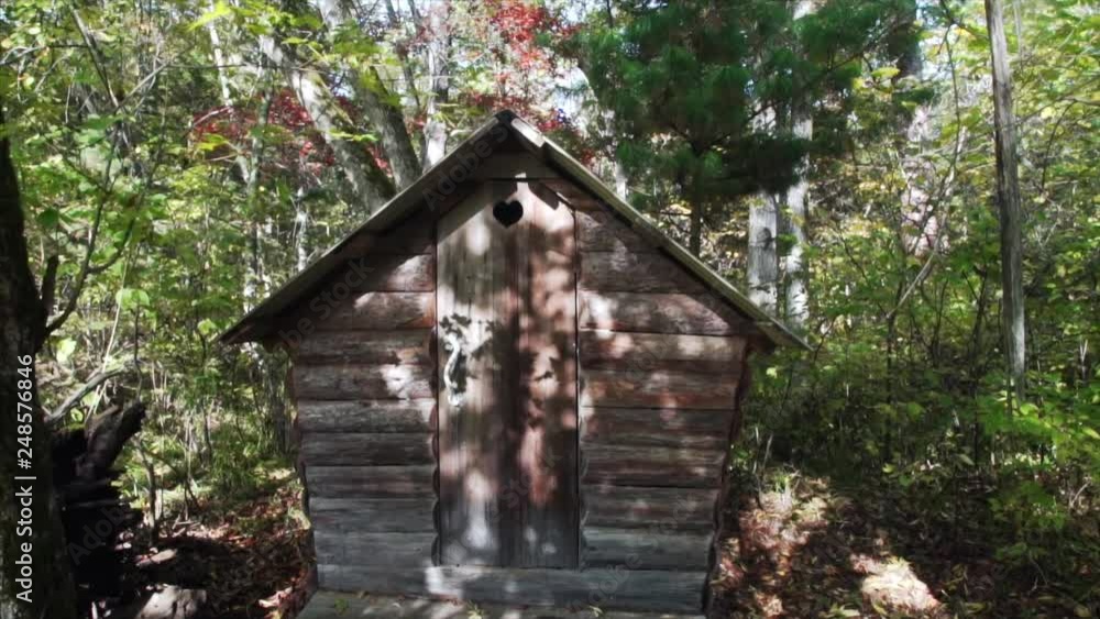 Nice small wooden toilet in the forest. Sikhote-Alin Nature biosphere ...