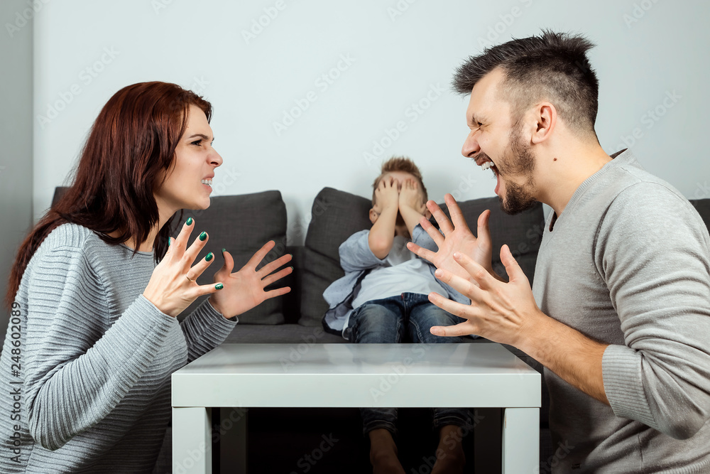 Family quarrel, poma and dad swear in the background of the son who ...