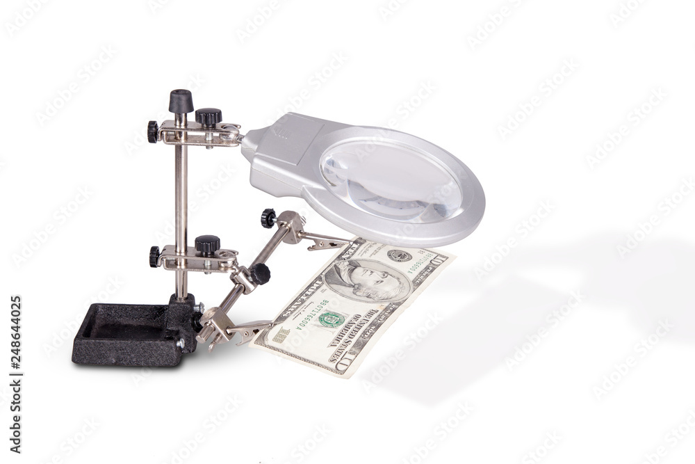 Checking fake money. Money under the magnifying glass. Control your ...