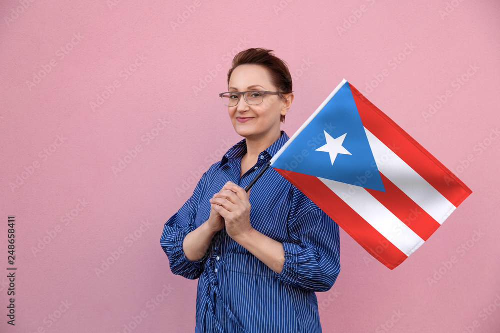 Puerto Rico flag. Woman holding Puerto Rican flag. Nice portrait of ...