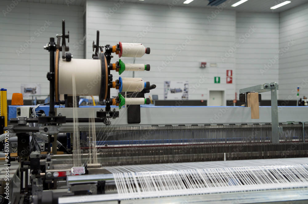 Weaving automatic machines - Weaving is a method of textile production ...