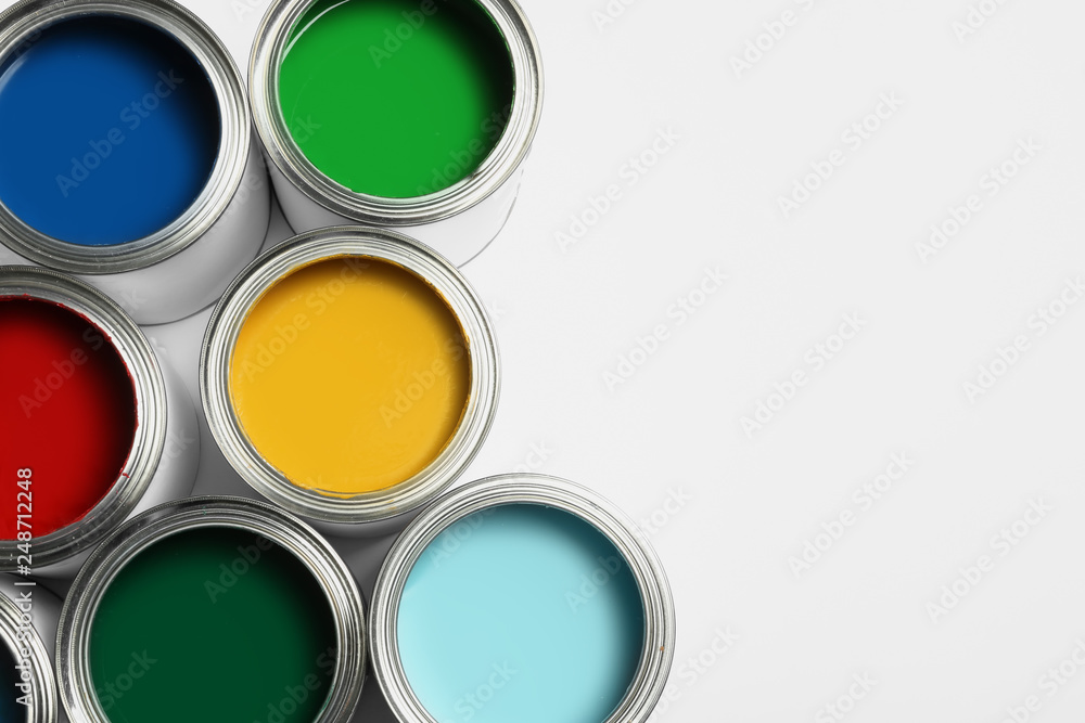 Open paint cans on white background, top view. Space for text Stock ...