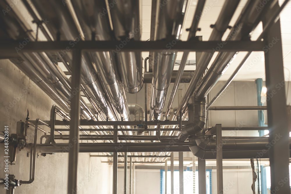 Equipment and piping inside of industrial plant. Factory. Various ...