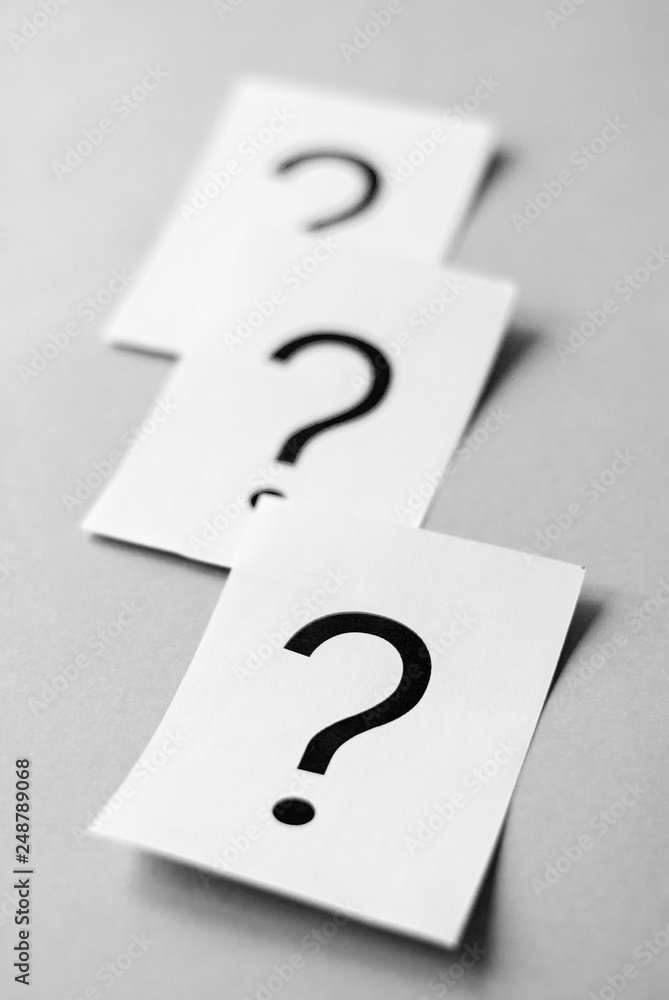 White cards with printed question marks Stock Photo | Adobe Stock