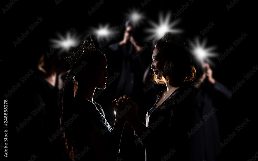 Miss Pageant beauty contest with Silver Diamond Crown hold hands ...