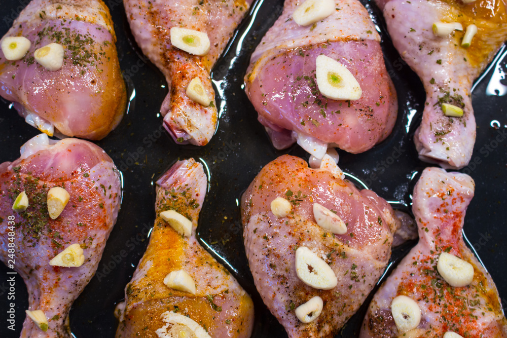 Cooking chicken legs Stock Photo | Adobe Stock