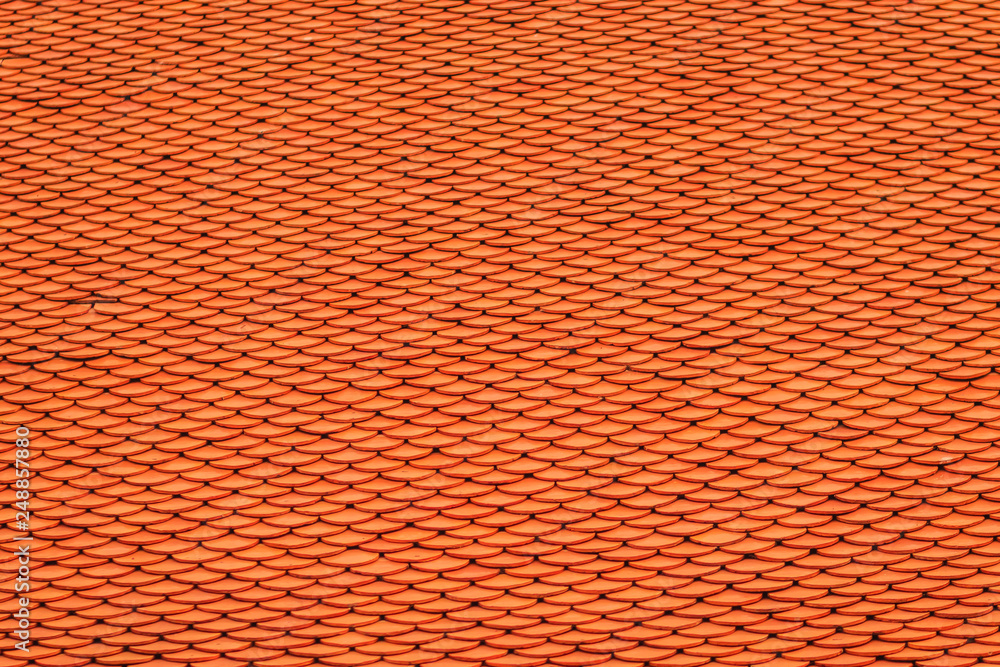 Old antique orange roof tiles pattern at the buddha temple in thailand ...