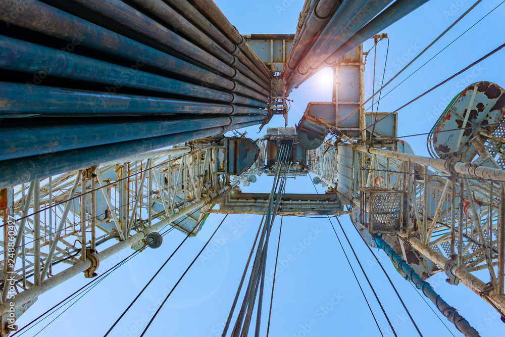 Oil and Gas Drilling Rig onshore dessert with dramatic cloudscape. Oil ...