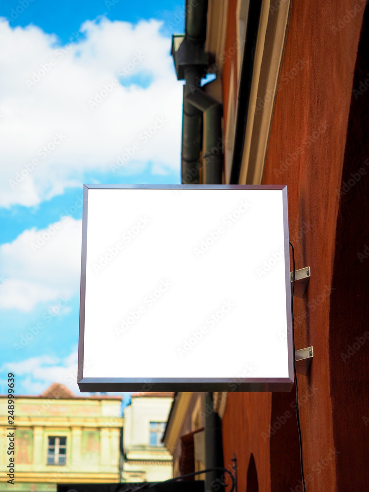 Signboard side view of empty white mock-up modern signage in silver ...