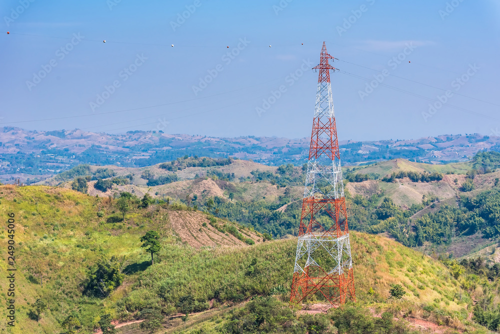 View of electricity pylon against a clear blue sky. ภาพถ่ายสต็อก ...
