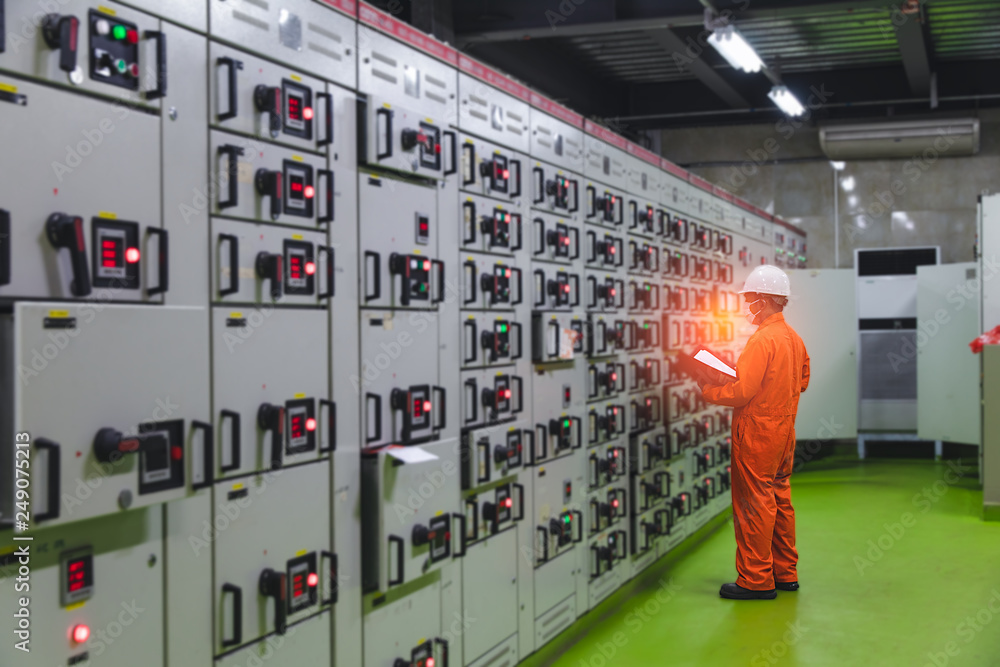 Soft focus of Engineer checking and monitoring the electrical system in ...