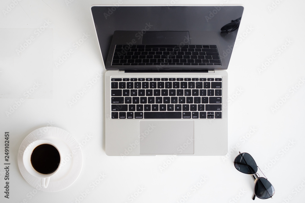 The high angle view of the gray laptop computer looks modern, placed on ...