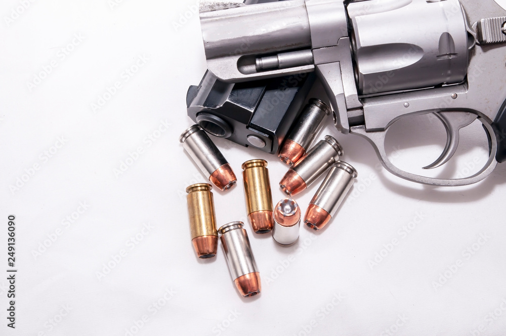 Two handguns, a 40 caliber pistol and a 357 magnum revolver with 40 ...