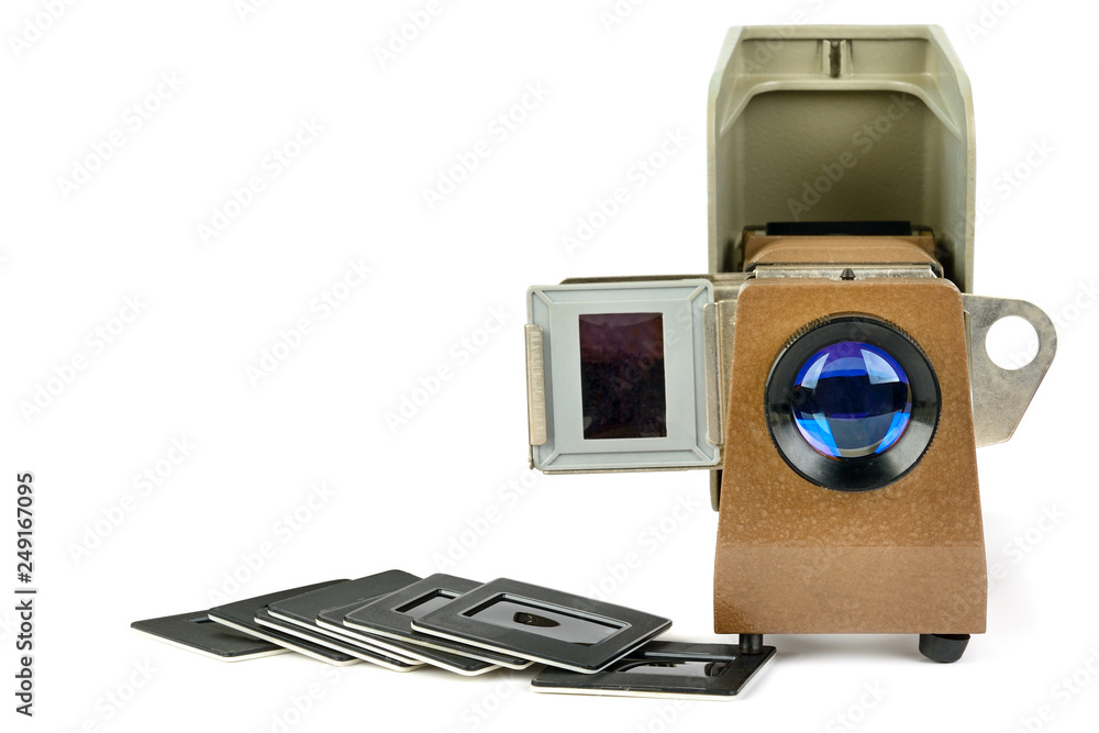 Old slide projector and set of slides isolated on white background ...