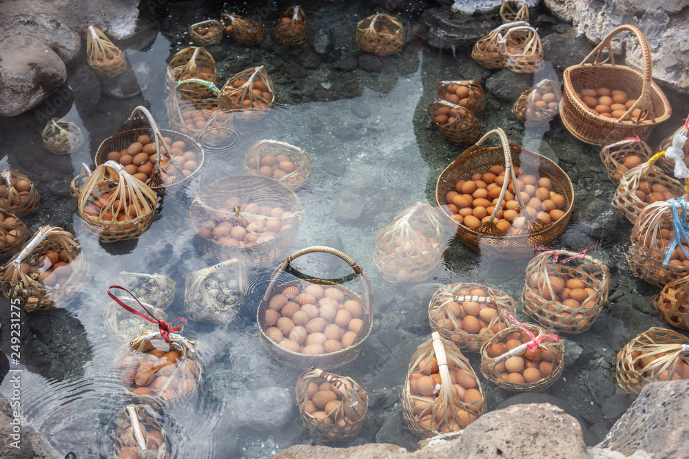 tourist boiling eggs in hot spring at Chae Son National Park Lampang ...