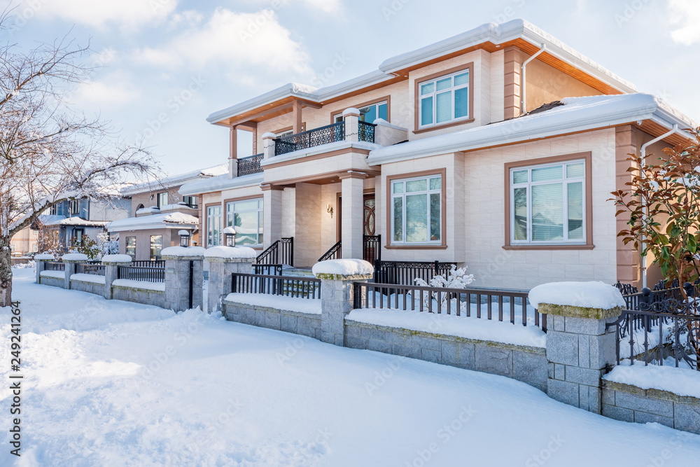 A typical american house in winter. Snow covered. Stock Photo | Adobe Stock